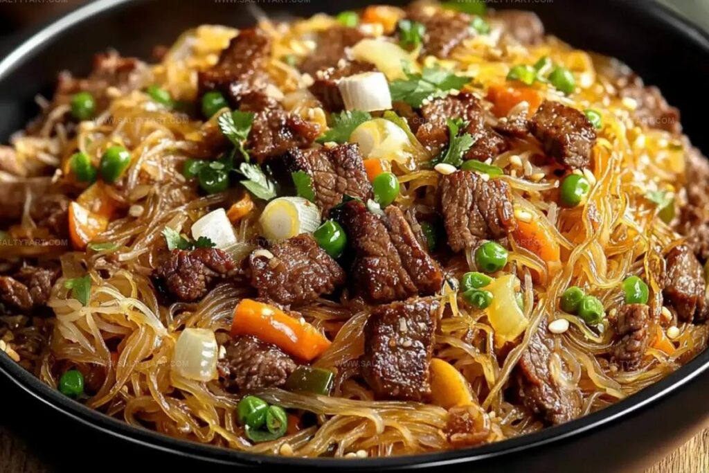 Sizzling Filipino Pancit With Beef Recipe: A Flavorful Fiesta - Salty Tart